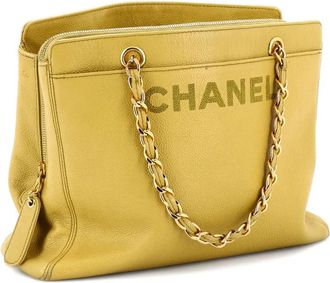 Chanel Mittelgro&szlig;er Kaviar-Tote Bag mit Logo - Gelb