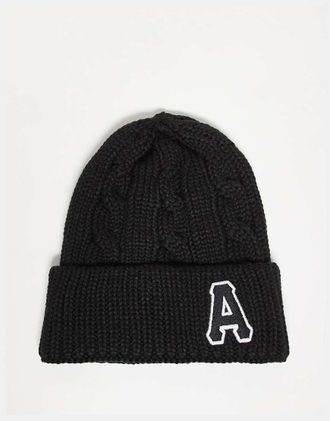 Aape By A Bathing Ape Aape by A Bathing Ape - Bonnet en maille torsad&eacute;e - Noir