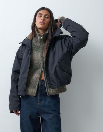Asos manteau de pluie court &agrave; capuche avec doublure en imitation peau de mouton noir