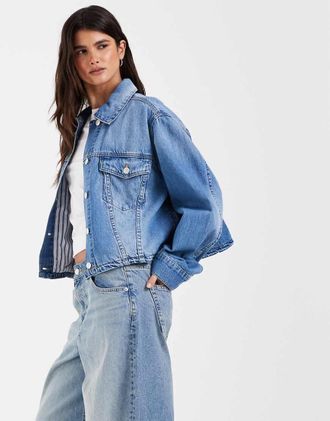 Asos veste en jean &agrave; ourlet boule avec doublure ray&eacute;e en bleu intense