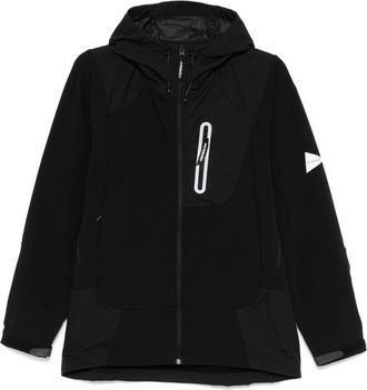 And Wander Jacke mit Kapuze - Schwarz