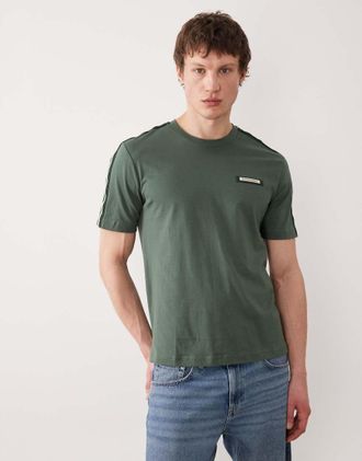Emporio Armani Armani EA7 - T-shirt ras de cou &agrave; bande griff&eacute;e - Vert