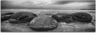 Paul Sinus Art Panoramabild auf Leinwand und Keilrahmen 150x50cm Neuseeland Steine Meer Strand schwarz weiß