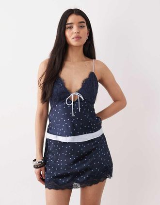 Abercrombie & Fitch Mini jupe-short &agrave; pois en satin et bordures dentelle - Bleu marine