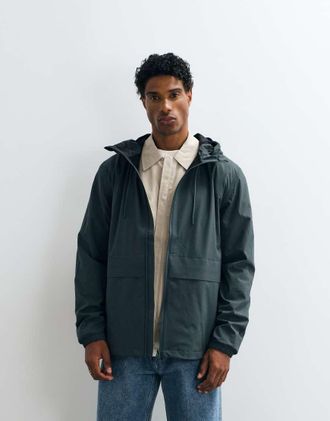 Rains 12420 Suva - Veste imperm&eacute;able d&eacute;contract&eacute;e &agrave; capuche - Vert