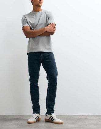 Calvin Klein Jeans jean slim fusel&eacute; bleu d&eacute;lav&eacute; fonc&eacute;