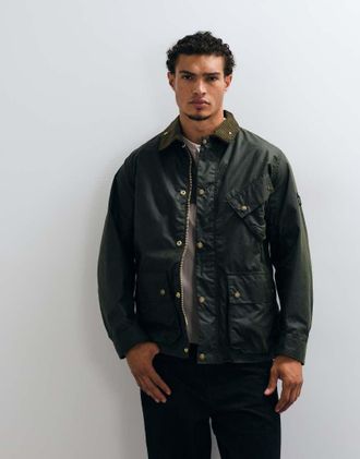 Barbour veste cir&eacute;e Brake avec col en velours c&ocirc;tel&eacute; contrastant en vert