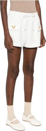 Valentino Garavani Femme, Shorts, Blanc, Taille: 40 FR Short de surv&ecirc;tement &agrave; cordon de serrage avec poches VLogo