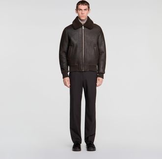 Sandro Blouson en peau lain&eacute;e