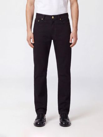 Versace Jean skinny en denim stretch avec logo Medusa &agrave; larri&egrave;re