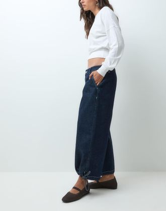 Collusion Jeans in 3/4-L&auml;nge mit Saumbindung in Rinse-Marineblau