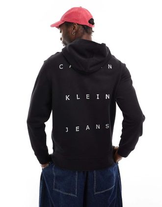 Calvin Klein Jeans Sweat à capuche imprimé dans le dos - Noir