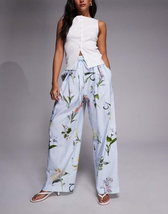 River Island Weit geschnittene Leinenhose in Hellblau mit Blumenmuster