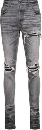 Amiri Verblasste Jeans in gemischter Baumwolle zerrissen - grau