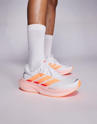 adidas adidas Running - Supernova Glide - Lauf-Sneaker in Orange und Wei&szlig;
