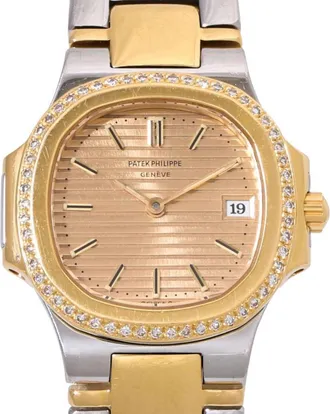 Patek Philippe Nautilus Vintage Lady steel/yellow gold 18k with factory diamonds