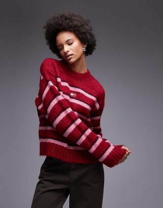 Tommy Jeans Flauschiger Pullover in rot und rosa gestreift mit Aufnäher