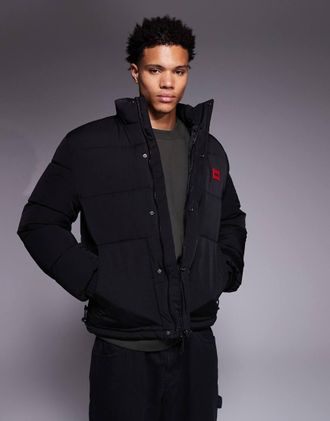 HUGO BOSS HUGO Red - Balto - Leichte Steppjacke in Schwarz mit Markenlogo