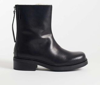 Vagabond Karlie bottines plates avec doublure chaude en cuir noir