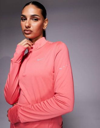 Nike Swift - Top manches longues en tissu Dri-FIT &agrave; col zipp&eacute; - Rose