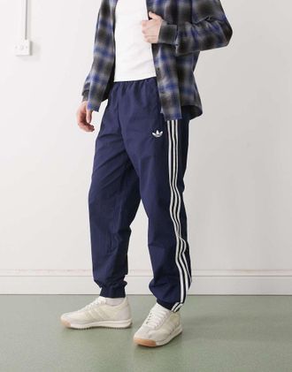 adidas Originals Firebird - Pantalon de surv&ecirc;tement tiss&eacute; - Indigo nuit-Bleu