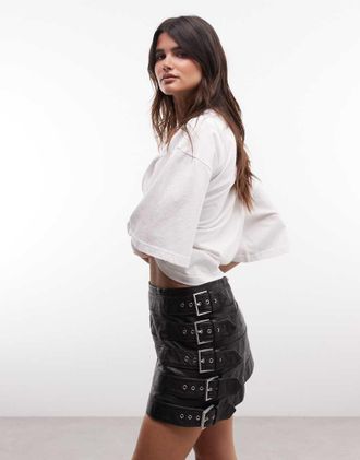 AllSaints Betty mini-jupe en cuir &agrave; boucle noire