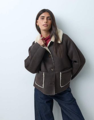 Asos veste doubl&eacute;e en peau retourn&eacute;e avec fausse fourrure cr&egrave;me marron
