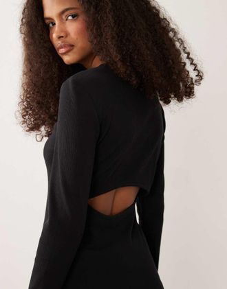 Calvin Klein Jeans top &agrave; manches longues avec &eacute;tiquette tiss&eacute;e et d&eacute;coupes noir
