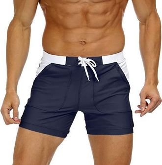KEFITEVD Boxer de bain pour homme Short de bain avec poches, taille &eacute;lastique et cordon de serrage Style sportif Coupe pr&egrave;s du corps, bleu fonc&eacute;, 32