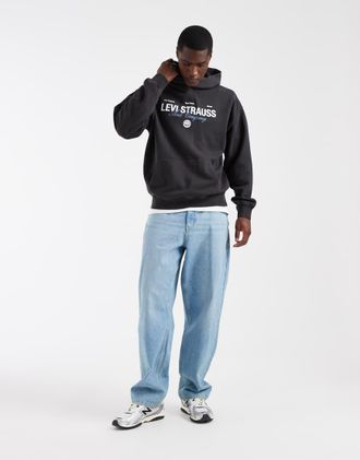 Levi's hoodie &agrave; imprim&eacute; graphique coucher de soleil en noir d&eacute;lav&eacute;
