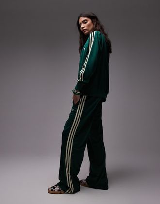adidas Originals Exclusivit&eacute; ASOS - adidas Originals - Firebird - Pantalon de surv&ecirc;tement ample - Vert fonc&eacute;