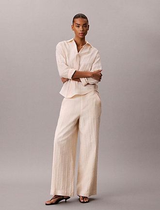Calvin Klein Pantalon relaxed &agrave; rayures transparentes en tissu froiss&eacute;