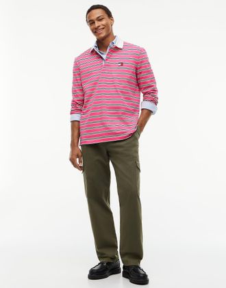 Tommy Jeans Tommy Badge Stripe Relaxed Fit Rugbyshirt in Pink Alert-Streifen-Rosa