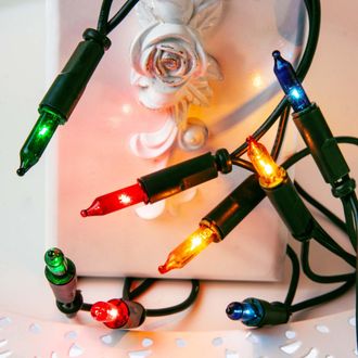 Hellum Lichterkette innen, 230V strombetrieben Lichterkette mit Stecker, 10 bunte Lichter, beleuchtete Länge 1,35m, Kabel grün Wohnzimmer Wintergarten Dekora