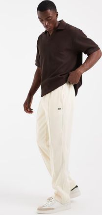 Lacoste Jogginghose in Beige mit weitem Bein-Neutral