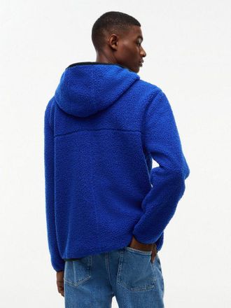 Tommy Jeans Pl&uuml;schjacke TJM REG BADGE TEDDY ZIP TRU EXT Freizeitjacke, &Uuml;bergangsjacke, Teddyjacke mit Logopatch