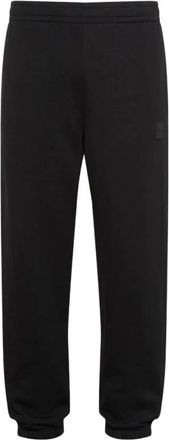 Calvin Klein Jogging en molleton &agrave; logo caoutchout&eacute; et bas resserr&eacute;s - Homme - Pantalons - Noir - Taille: M