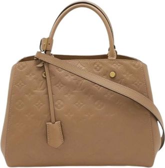 Louis Vuitton Sac &agrave; main Montaigne Monogram Empreinte Pre-owned - Femme - Pre-owned - Brun - Taille: ONE Size