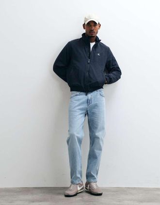 Calvin Klein Jeans gepolsterte Nylon-Harringtonjacke in Marineblau