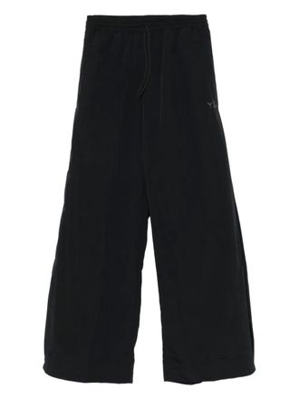 Yohji Yamamoto pantalon de jogging ample à lien de resserrage - Noir
