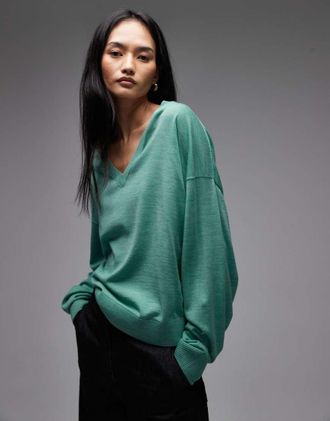 & Other Stories Pullover in T&uuml;rkisblau mit hohem Wollanteil und V-Ausschnitt