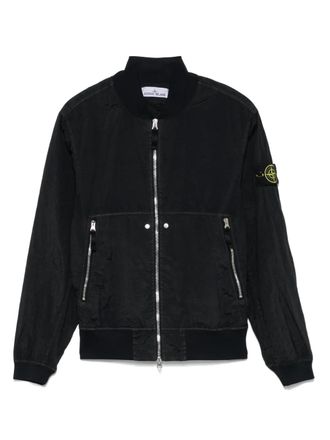 Stone Island veste matelassée à patch Compass - Noir
