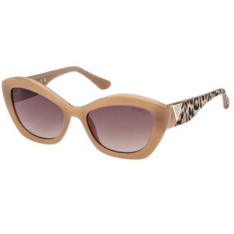 Guess Sonnenbrille mit Farbverlauf und braunen Gl&auml;sern sowie einem gl&auml;nzenden beigefarbenen Rahmen