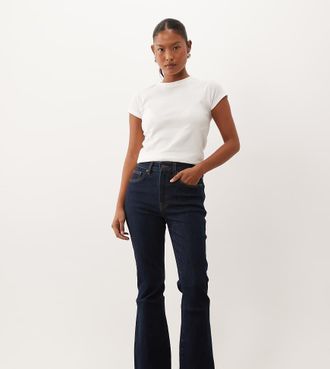 Good American Petite jean flare d&eacute;lav&eacute; bleu fonc&eacute;