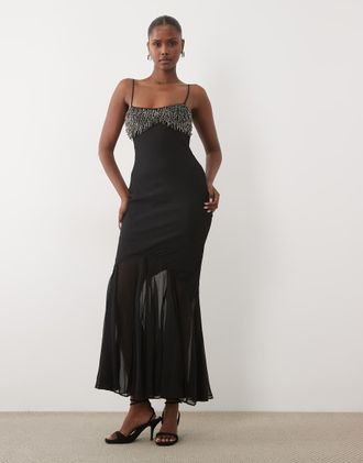 Asos Robe longue et &eacute;chancr&eacute;e &agrave; bretelles en biais avec bustier &agrave; franges et perles - Noir