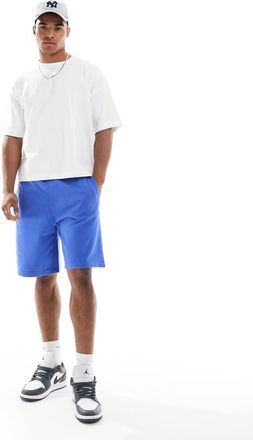 Superdry Essential - Short en jersey à logo - Bleu chambray