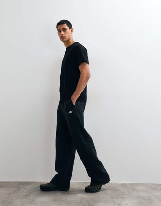 New Balance pantalon de jogging en polaire sport essentials noir
