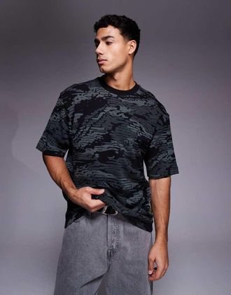 Boss Orange by Hugo Boss Wildnature - Strick-T-Shirt in Schwarz mit Military-Muster