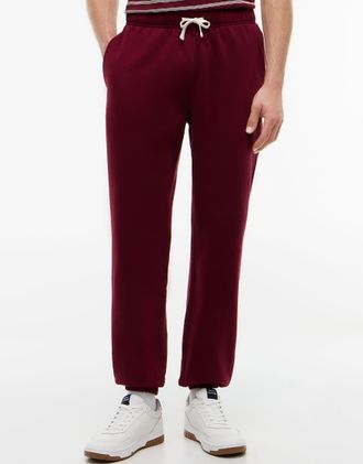 Tommy Hilfiger Jogginghose aus Fleece mit Kontrast-Kordelzug und B&uuml;ndchen in Burgunderrot-Lila
