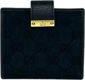 Gucci Portefeuille bifold en toile et cuir GG Pre-owned - Femme - Pre-owned - Noir - Taille: ONE Size